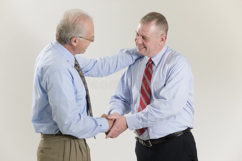 Businessmen Shaking Hands in Congratulations. Stock Image - Image of ...