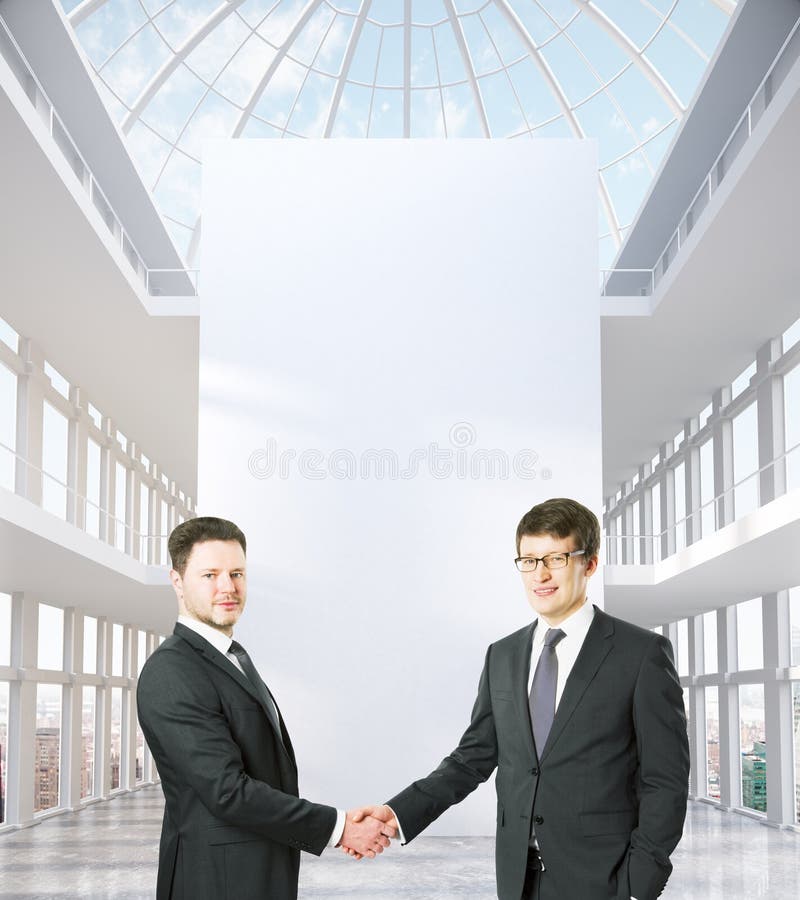 Businessmen shaking hands stock image. Image of handsome - 79762457