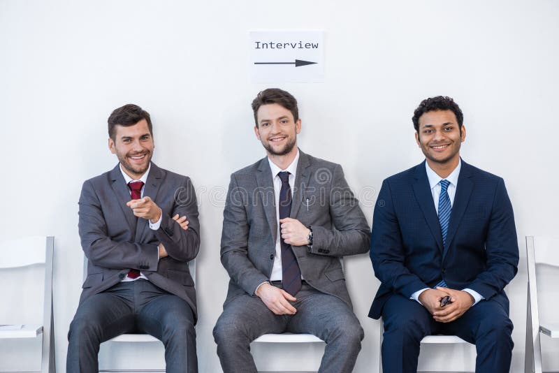Businessmen Sitting in Queue and Waiting for Interview in Office Stock ...