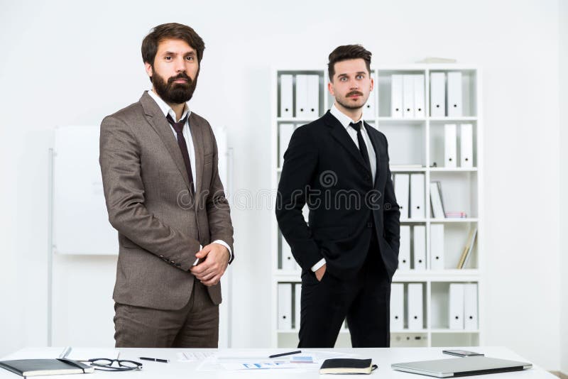 Businessmen Standing in Office Stock Image - Image of colleagues ...