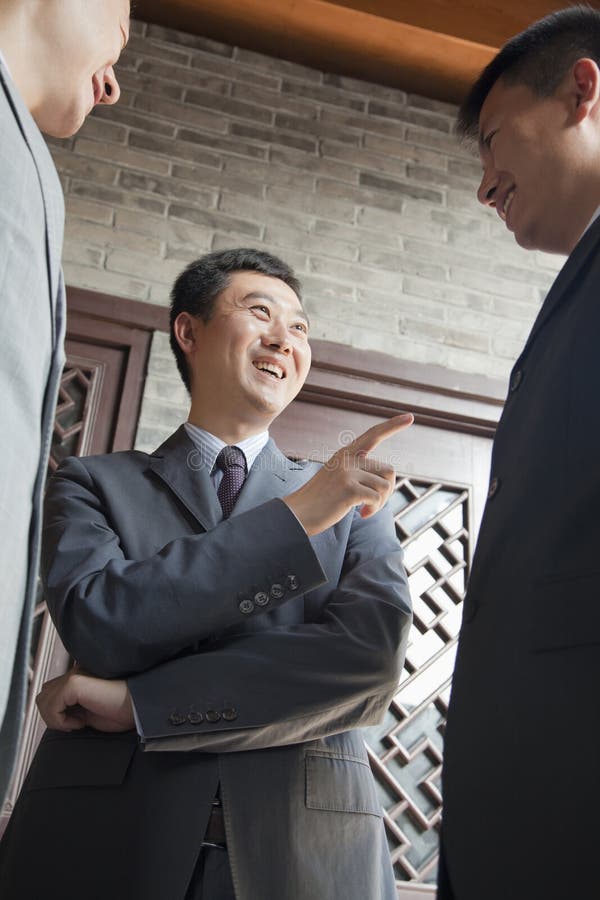 Businessmen Talking stock photo. Image of color, frame - 31693250