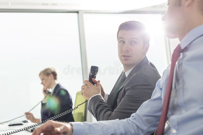 Businessmen Talking while Working at Modern Office Stock Image - Image ...