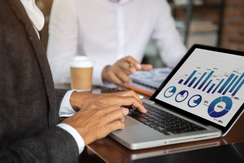Businessmen Team or Financial Data Analysts Working with Tablets and ... Businessmen Team or Financial Data Analysts Working with Tablets and ...