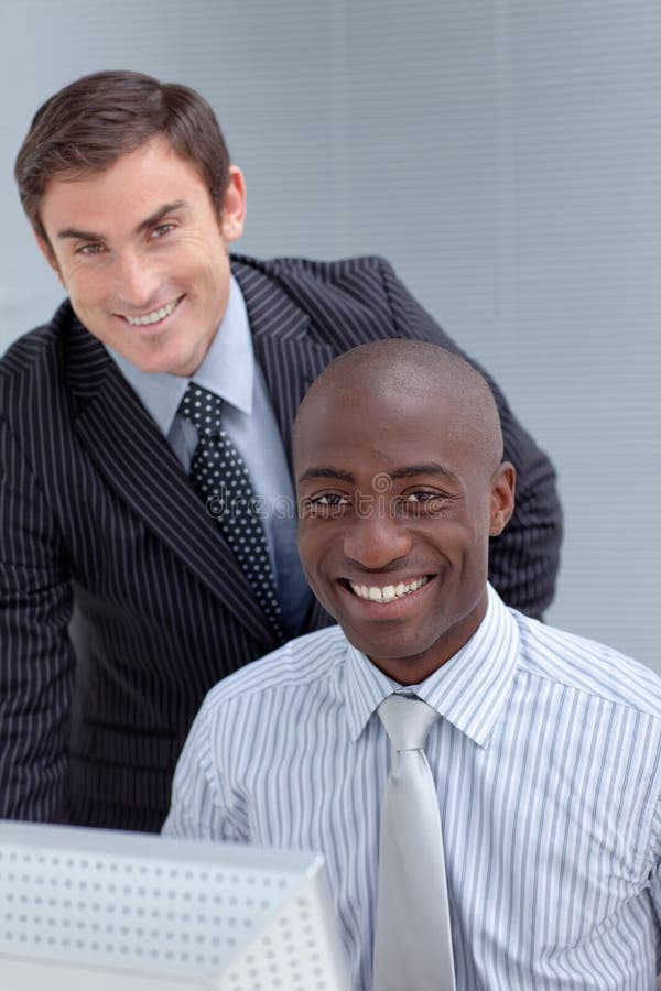 Businessmen Using a Computer Together Stock Photo - Image of adult ...