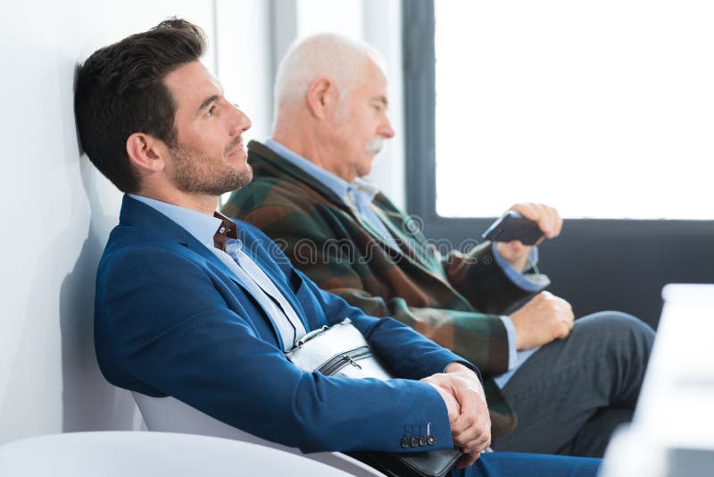 Businessmen in Waiting Room Stock Image - Image of frustration ...