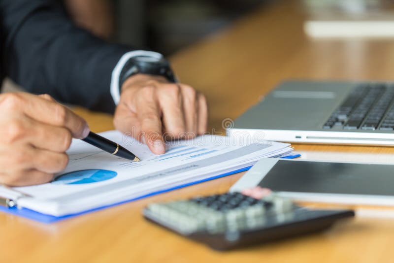 Businessmen Working on Graphs in Office, Business Accounting Stock ...