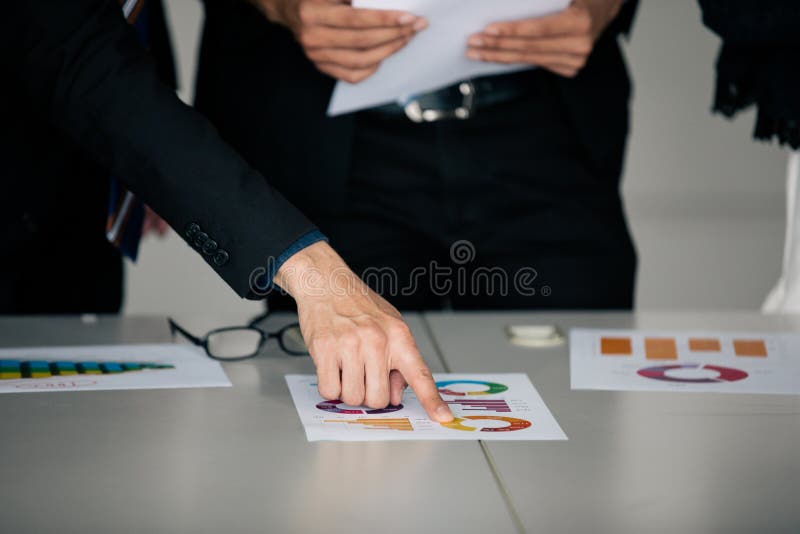 Businessmen Working and Point on Graph Financial Diagram and Analysis ...