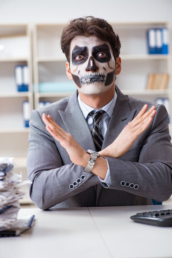 Businessmsn with Scary Face Mask Working in Office Stock Photo - Image ...