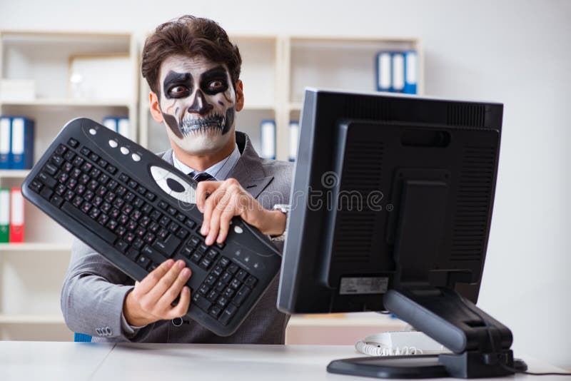 Businessmsn with Scary Face Mask Working in Office Stock Image - Image ...