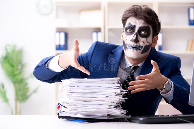 Businessmsn with Scary Face Mask Working in Office Stock Image - Image ...