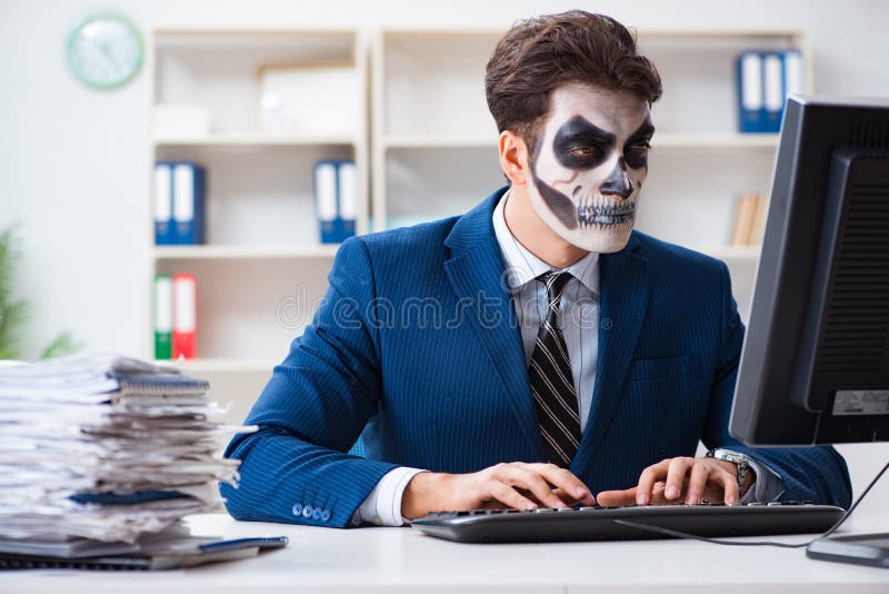 Businessmsn with Scary Face Mask Working in Office Stock Image - Image ...