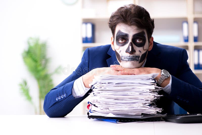 Businessmsn with Scary Face Mask Working in Office Stock Image - Image ...