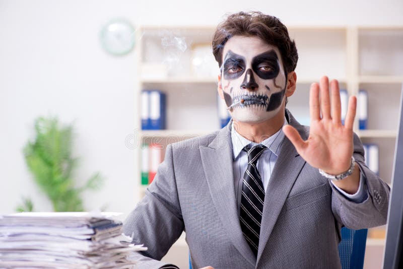 Businessmsn with Scary Face Mask Working in Office Stock Photo - Image ...