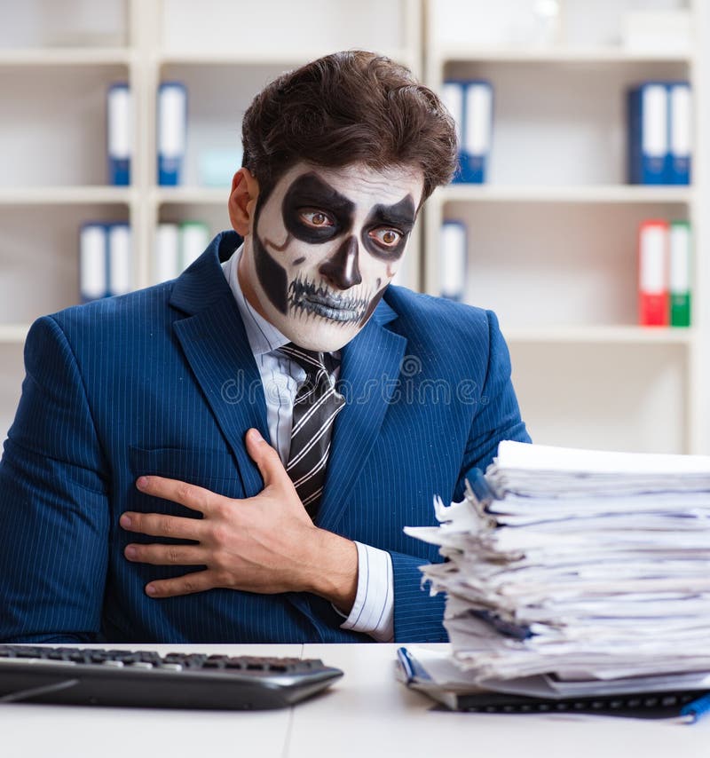 Businessmsn with Scary Face Mask Working in Office Stock Image - Image ...