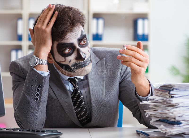 Businessmsn with Scary Face Mask Working in Office Stock Image - Image ...