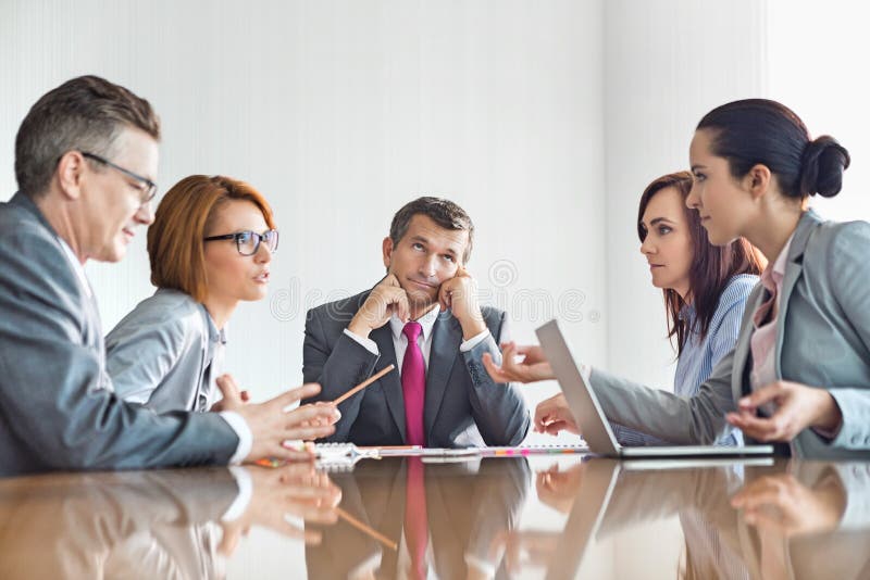 Businesspeople Arguing in Meeting Stock Image - Image of laptop ...