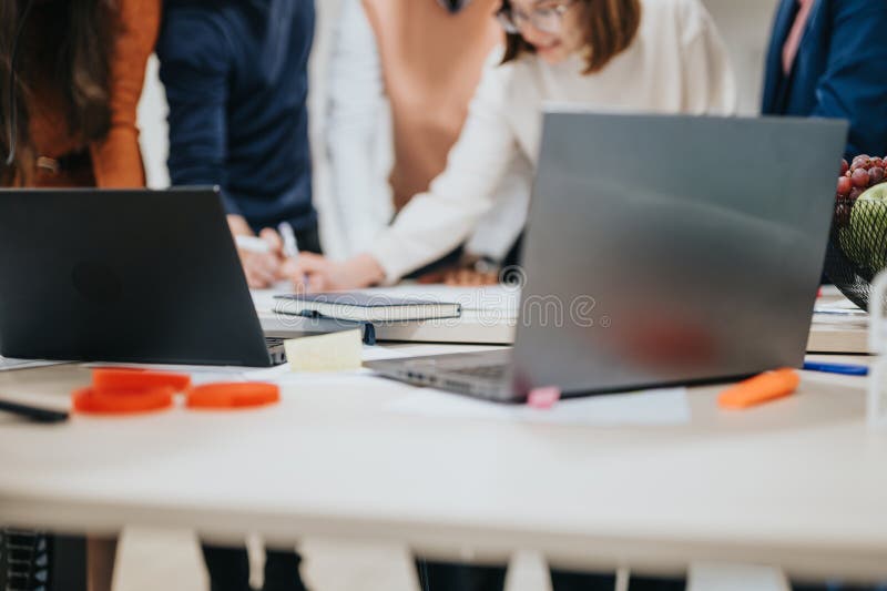 Businesspeople Collaborating on Project Development and Analyzing ...