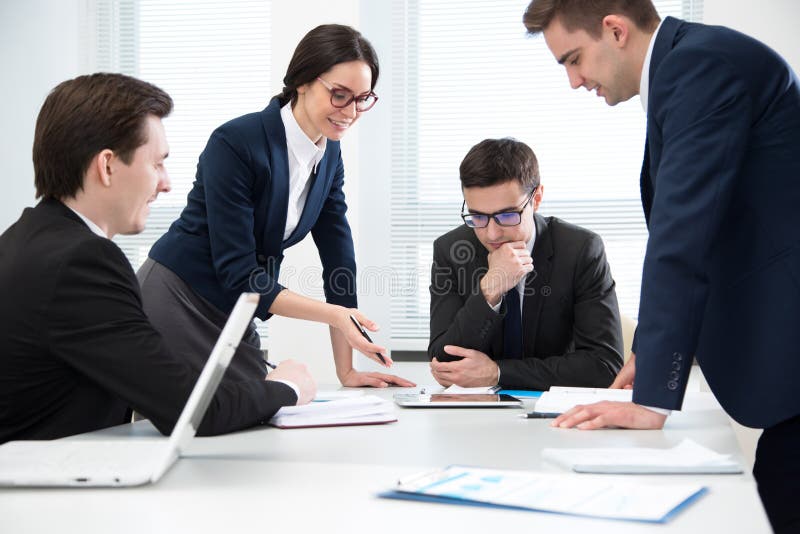 Businesspeople Discuss a New Project Stock Photo - Image of busy ...