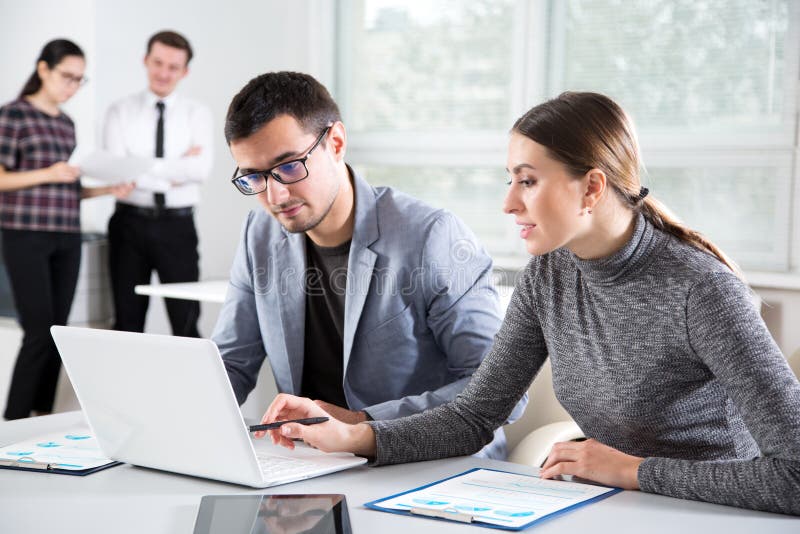 Businesspeople Discuss a New Project Stock Photo - Image of adult ...