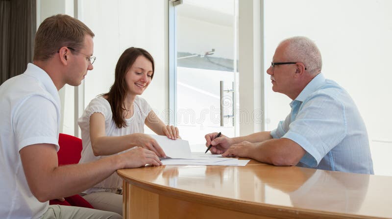Businesspeople Discussing a Joint Project Stock Photo - Image of ...