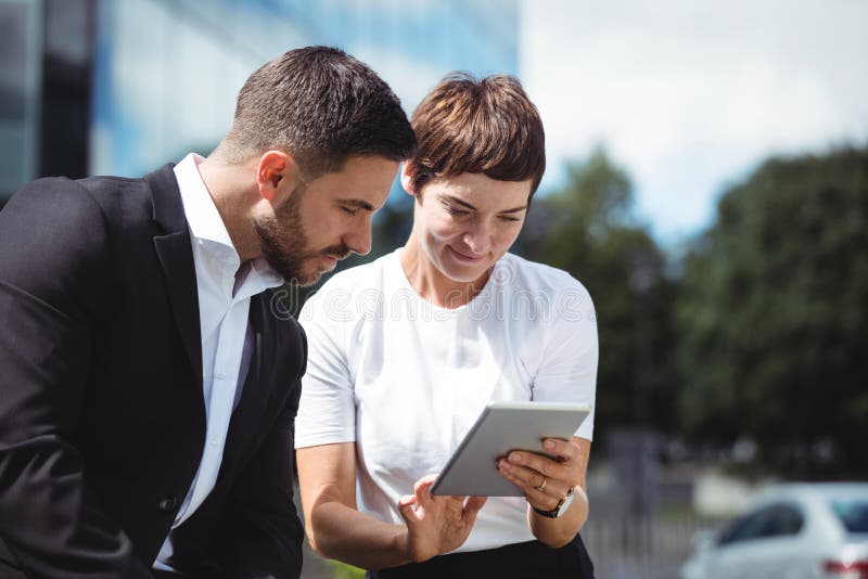 Businesspeople Discussion on Digital Tablet Stock Image - Image of ...