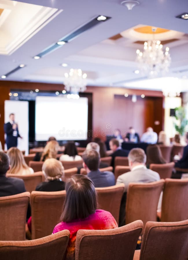 Businesspeople during Discussion Panel. Male Presenter Speaking in ...
