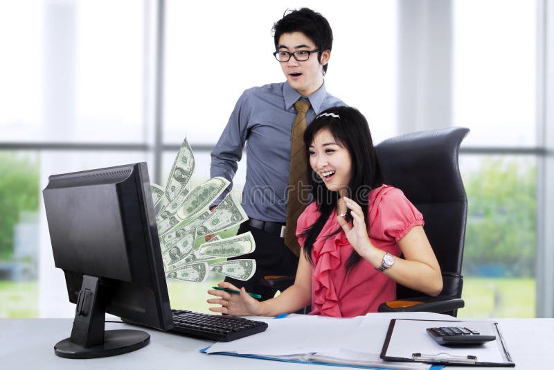 Businesspeople Getting Money from Internet Stock Photo - Image of ...