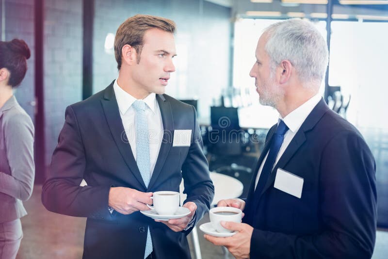 Businesspeople Having a Discussion during Break Time Stock Photo ...