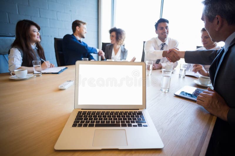Businesspeople Having a Discussion in Conference Room Stock Photo ...