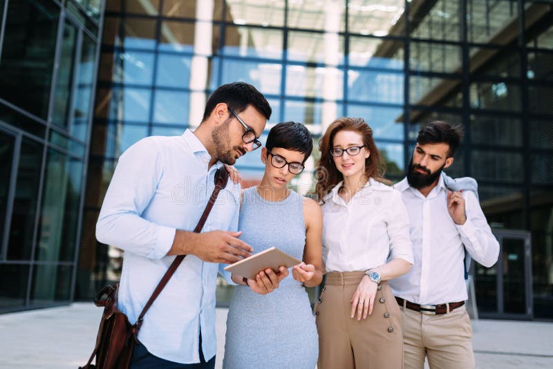 Businesspeople Having Discussion in Front of Company Stock Image ... Businesspeople Having Discussion in Front of Company Stock Image ...