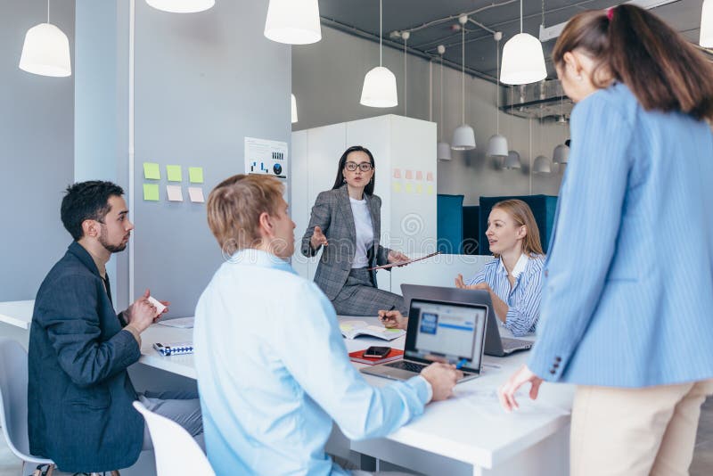 Businesspeople Having a Discussion in a Meeting Room Stock Image ...