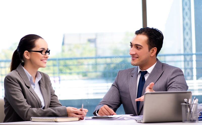 Businesspeople Having Discussion in the Office Stock Photo - Image of ...