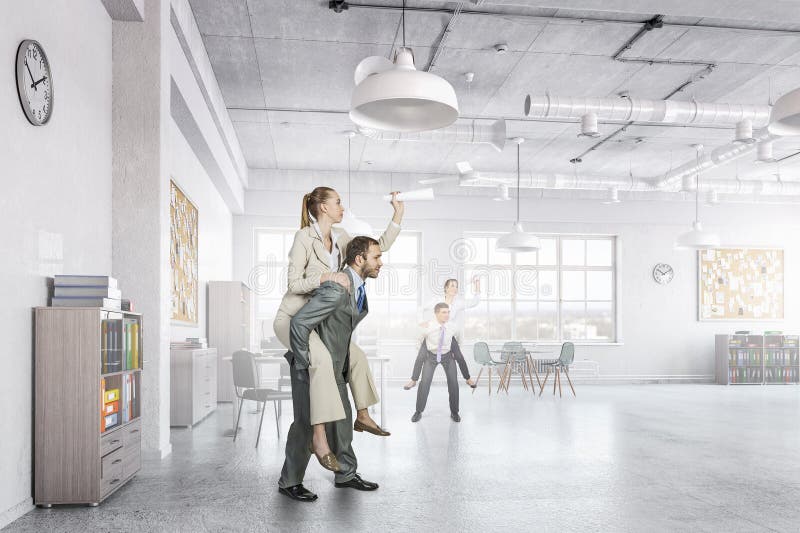 Businesspeople Having Fun in Office . Mixed Media Stock Image - Image ...