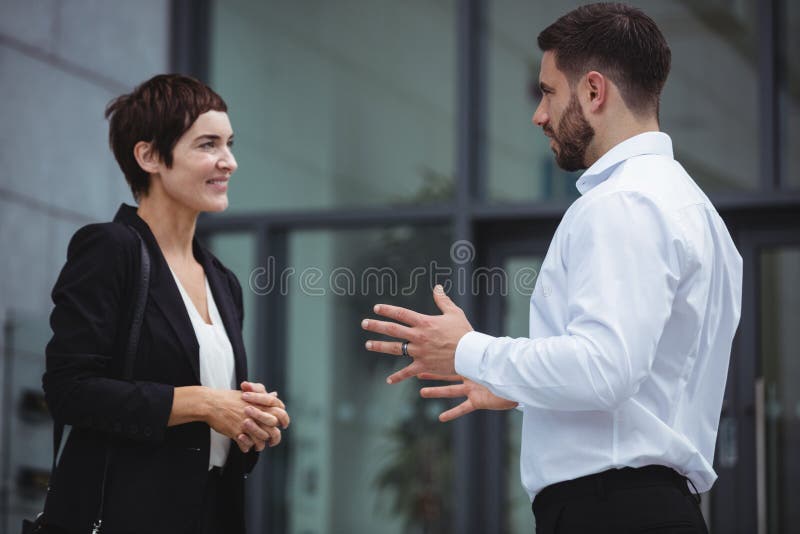 Businesspeople Interacting with Each Other Stock Image - Image of ...
