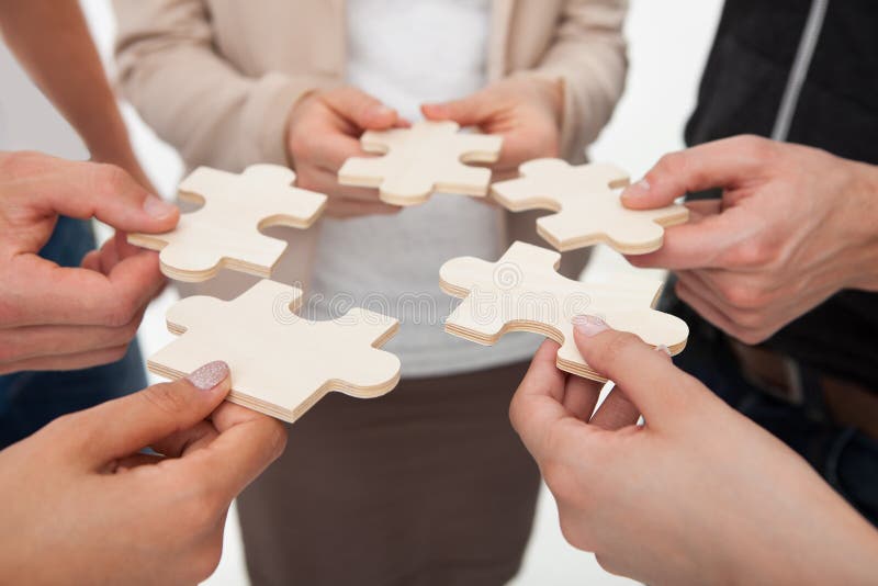 Joining two puzzle pieces stock image. Image of successful - 13405903
