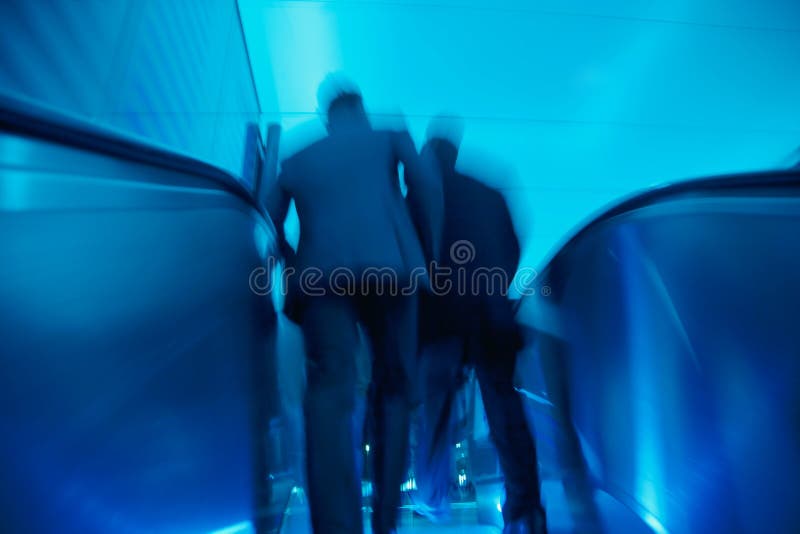 Businesspeople Leaving an Office Building, Motion Blur Stock Photo ...