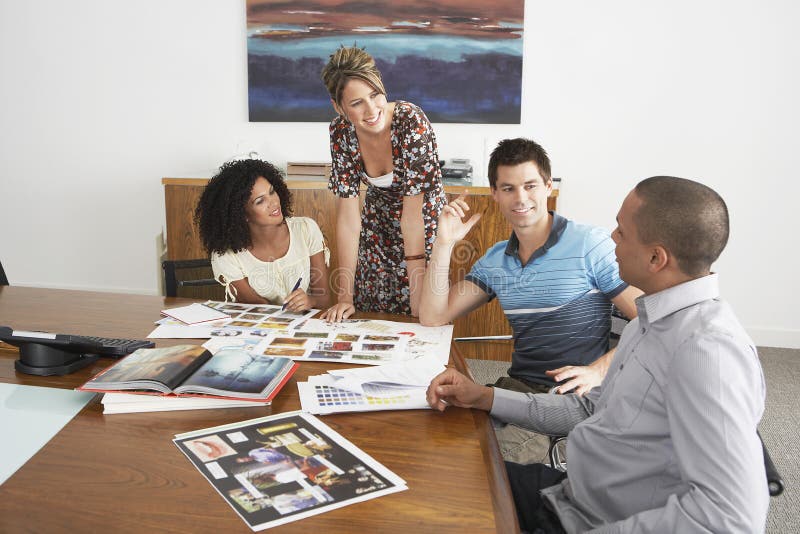 Businesspeople in Meeting at Conference Table Stock Photo - Image of ...