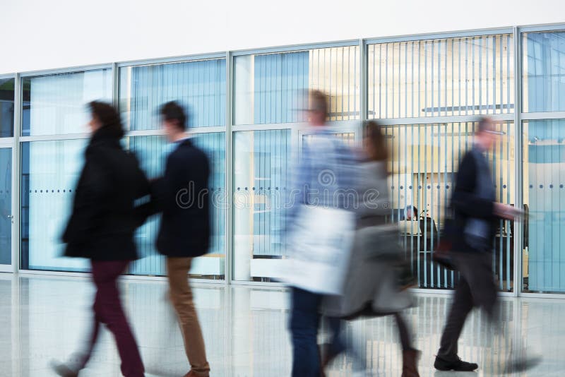 Businesspeople in Motion Blur Stock Photo - Image of concept, inside ...