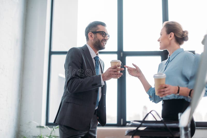 Businesspeople Chatting and Drinking Coffee Stock Image - Image of ...