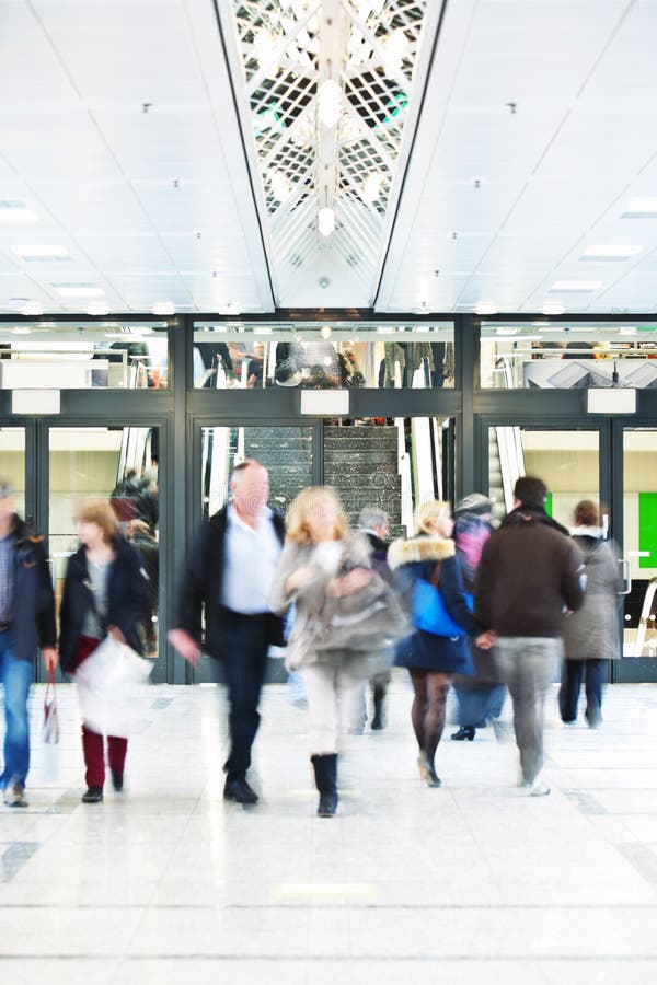 Businesspeople Rushing in Office Building, Motion Stock Image - Image ...