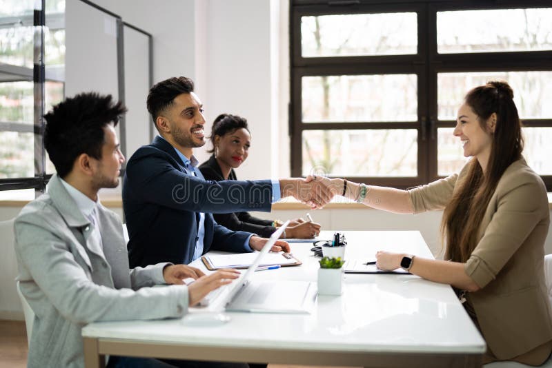 Businesspeople Shaking Hands after Interview Stock Image - Image of ...