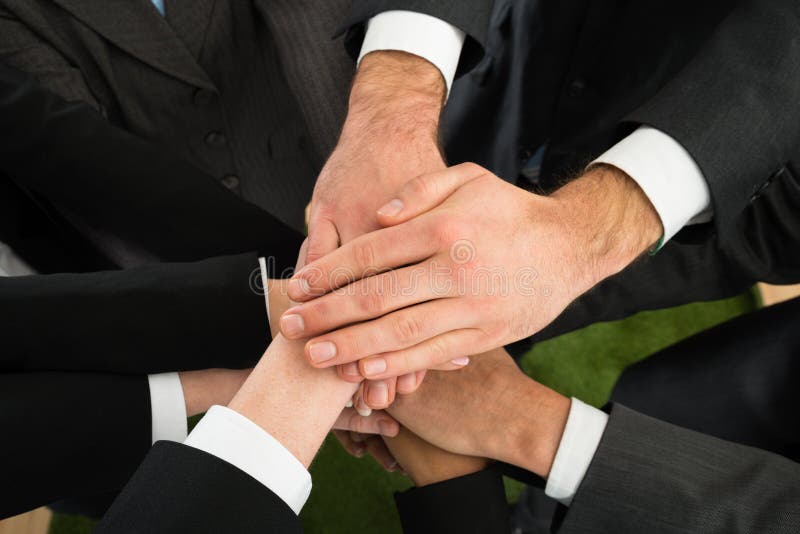 Businesspeople Stacking Their Hands Together Stock Image - Image of ...