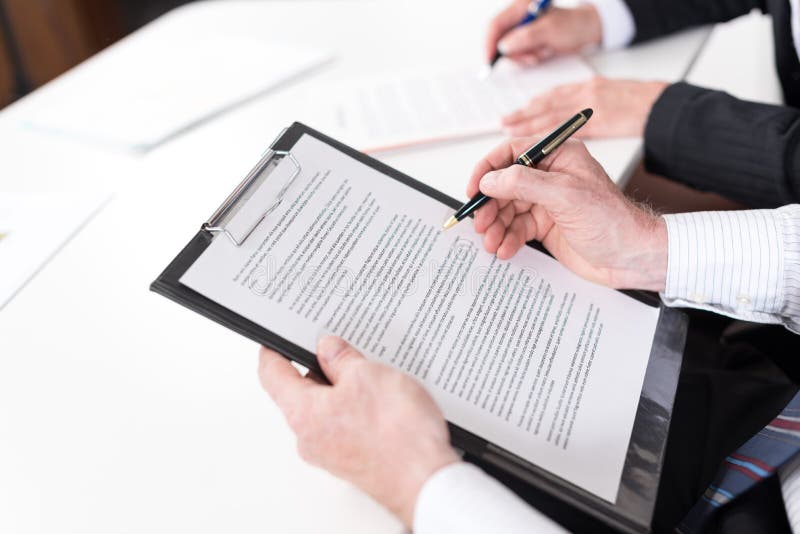 Businesspeople Taking Notes Stock Photo - Image of business, paperwork ...