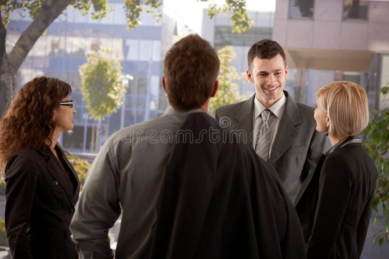 Businesspeople Talking Outdoor Stock Image - Image of brunette ...