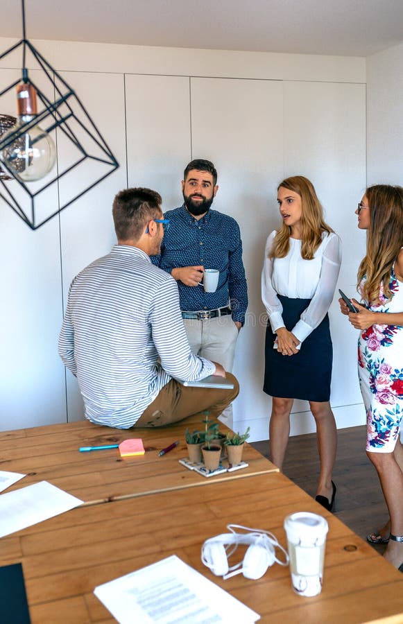 Businesspeople Talking at Work Break in the Office Stock Image - Image ...
