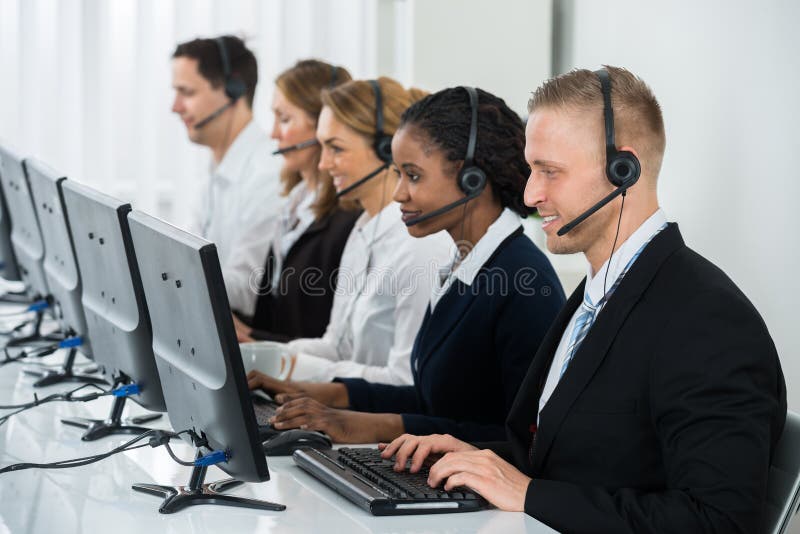 Businesspeople Working in Call Center Stock Photo - Image of ...