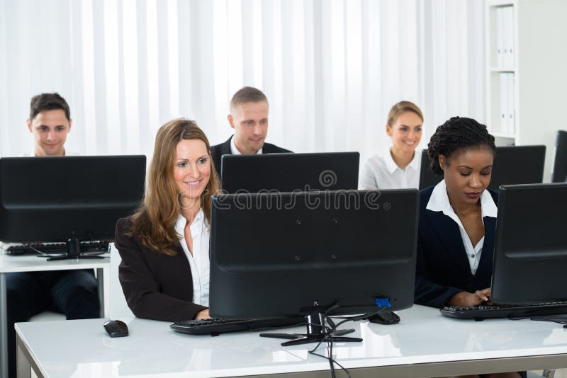 Businesspeople Working on Computers Stock Image - Image of american ...