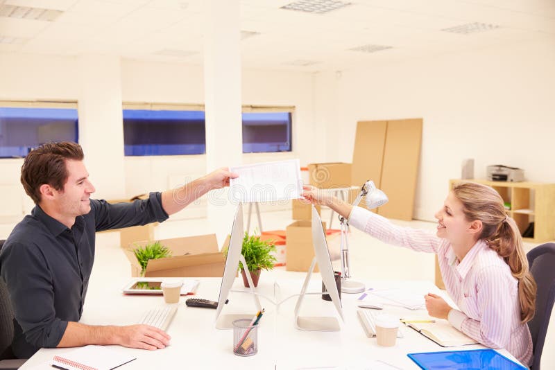 Businesspeople Working at Desks in New Office Stock Photo - Image of ...