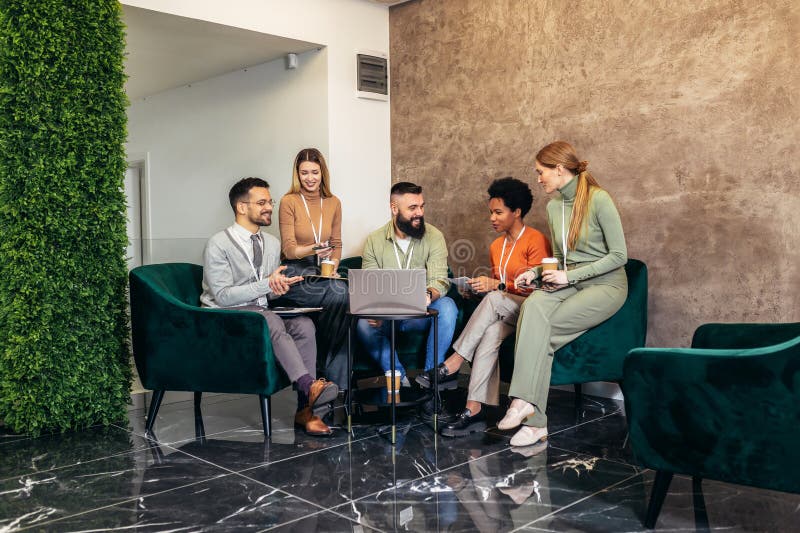 Businesspeople Working in an Office Lobby. Stock Image - Image of ...