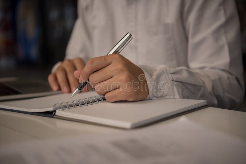 Businessperson Reading and Writing on Book.education Studying Knowledge ...